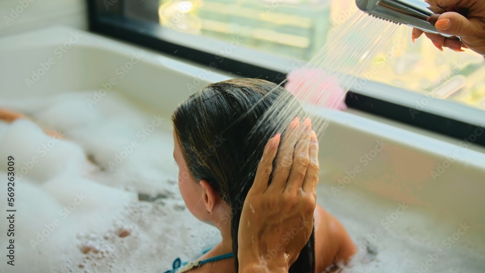 Happy single-parent family with a child, good mother and daughter take ...