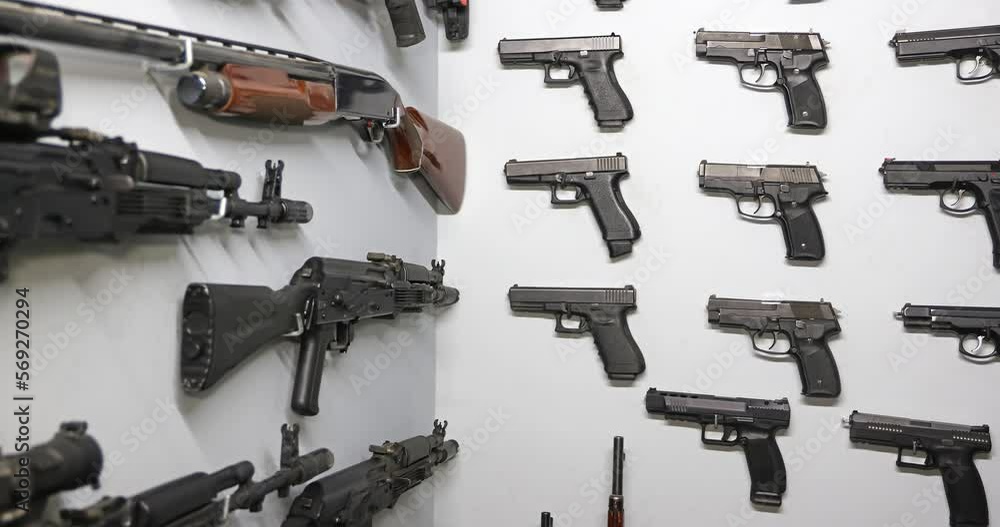 Gun shop or handing out pistols, rifles, revolvers in a shooting range ...
