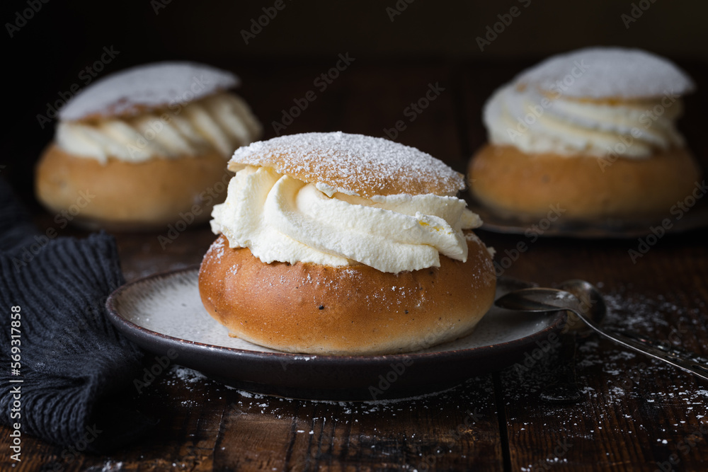Semlor Swedish traditional cream bun with cardamom and almond paste ...
