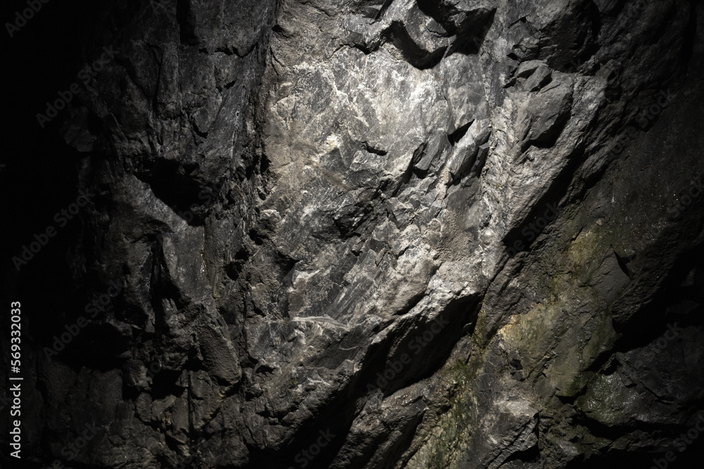 Cave wall of natural rough gray marble. Abstract background texture ...