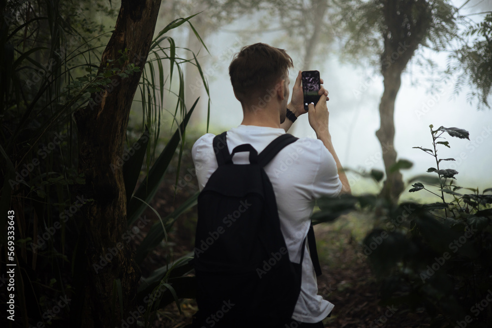 Young man in nature. People and forest. Healthy lifestyle. Happy walk ...
