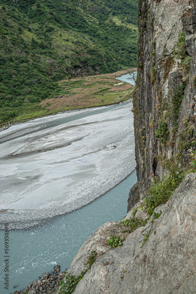 View of Marshyangdi river and Tal village as seen on route of Around ...