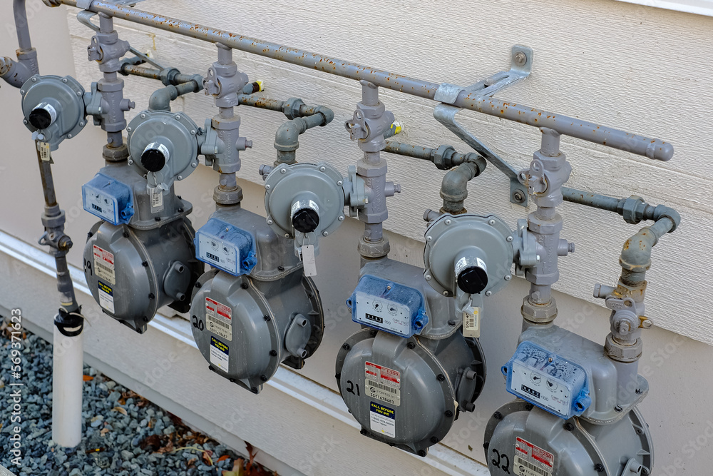 Residential natural gas meter measuring gas consumption and pressure ...