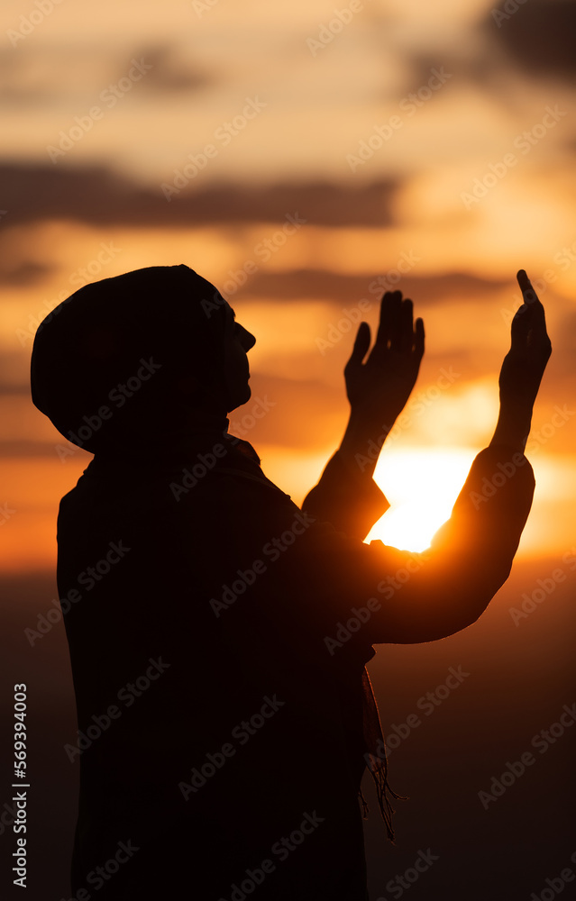 Silhouette of Muslim woman prayer having worship and praying with hands ...