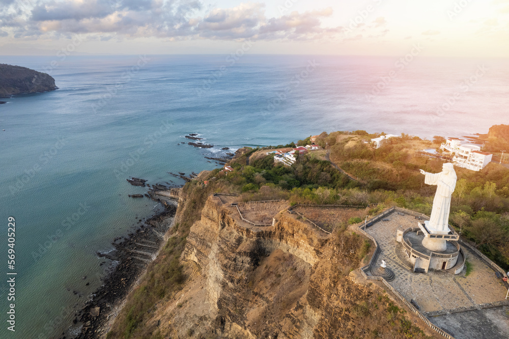 Jesus christ monument on rock Stock Photo | Adobe Stock
