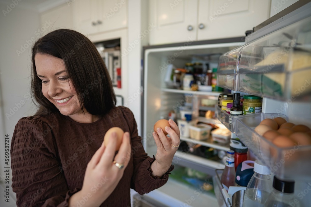 Getting food out of the fridge. Beer in the fridge. Fridge full of food ...