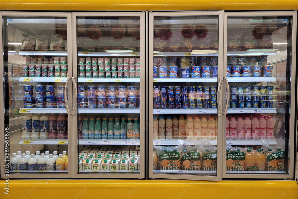 PENANG, MALAYSIA - 27 JAN 2023: View of huge glass fridge with various ...