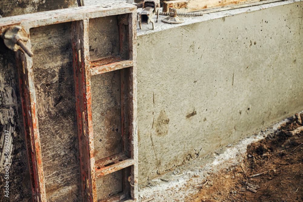 Concrete foundation with reinforcement and metal slab. Formwork for ...