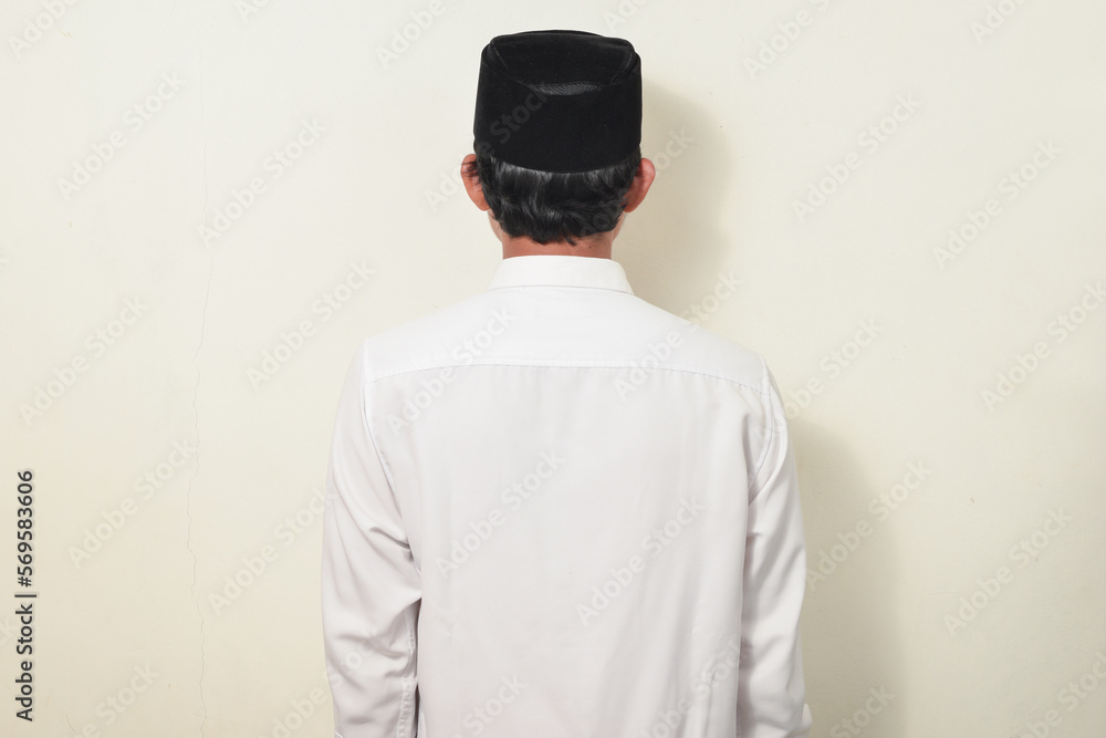 portrait of asian man turning over. asian man standing back view ...