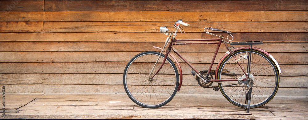 Banner panorama size of Vintage bicycle on old rustic dirty wall house ...