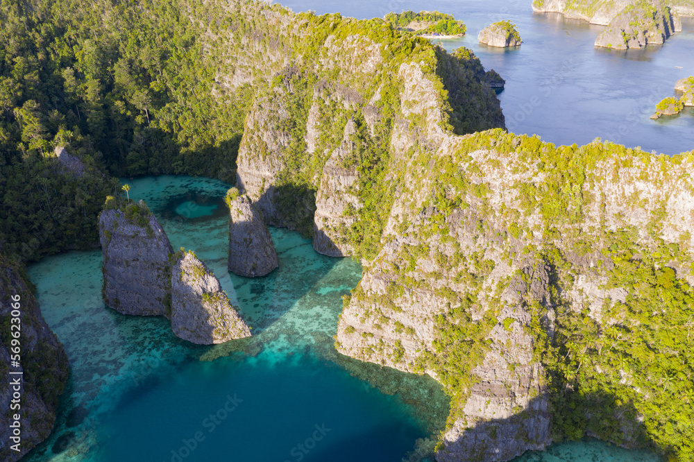 Beautiful limestone islands rise from the Raja Ampat, Indonesia ...