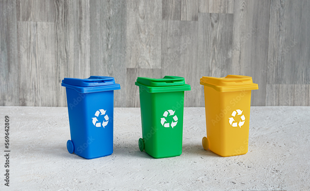 Multi-colored dustbins for organic, plastic and paper trash, waste ...