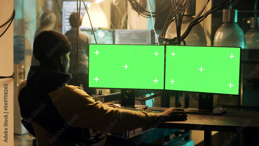 Mysterious criminal using greenscreen display to hack web network ...