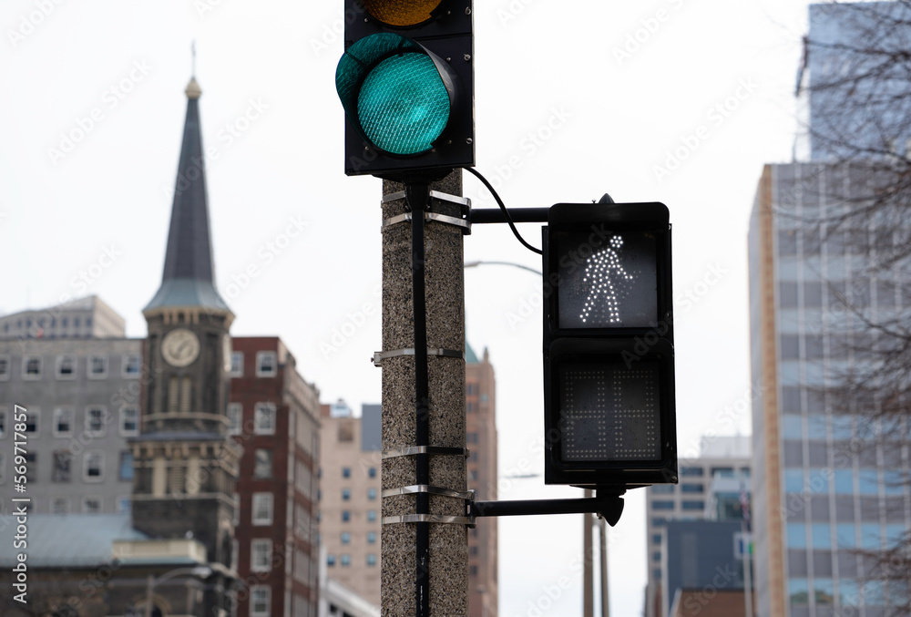 A closeup of a city traffic light giving the right of way to ...
