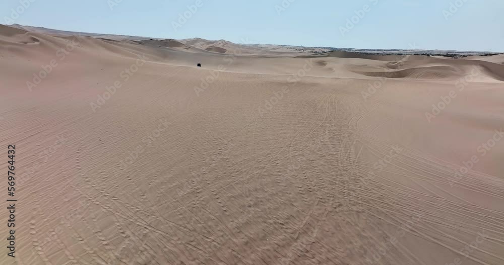 Dune buggies in Huacachina, Peru desert. Fast sand buggy driving on the ...
