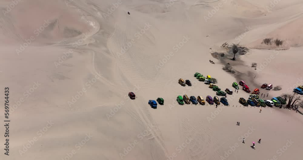 Dune buggies in Huacachina, Peru desert. Fast sand buggy driving on the ...