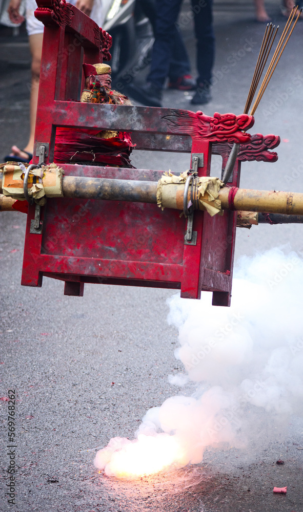 an traditional activity of Taiwan, set off firecrackers with god statue ...