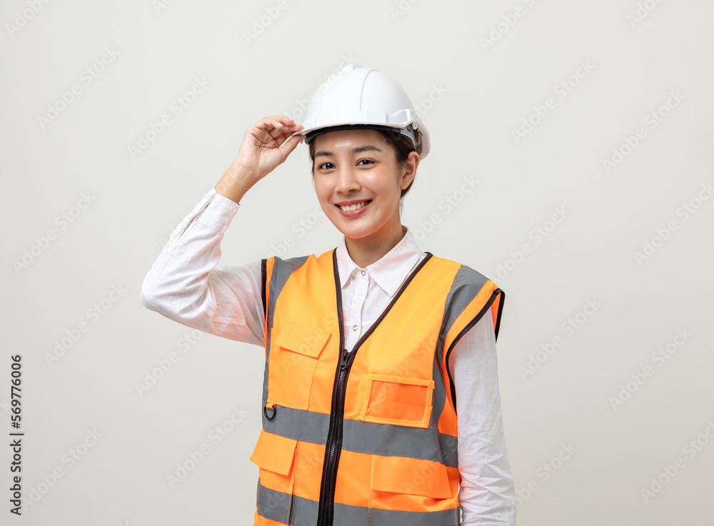 Asian engineer worker woman or architect with white safety helmet ...