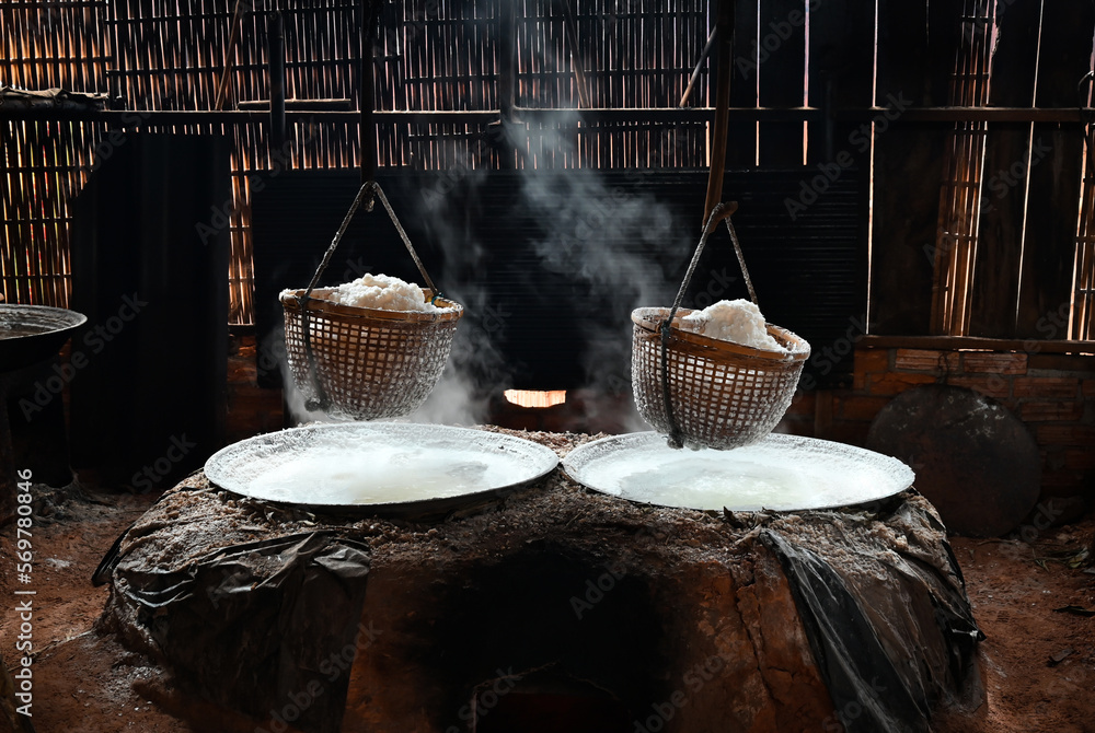 Close-up of ancient salting. The ancient method of boiling salt in a ...