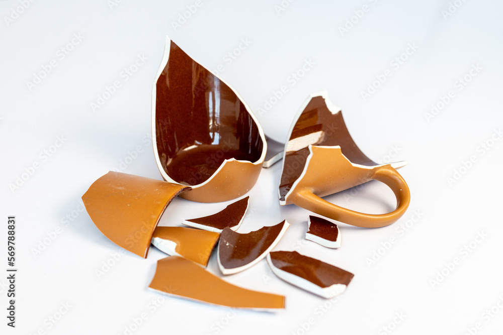 Broken tea cup isolated on white background Stock Photo | Adobe Stock