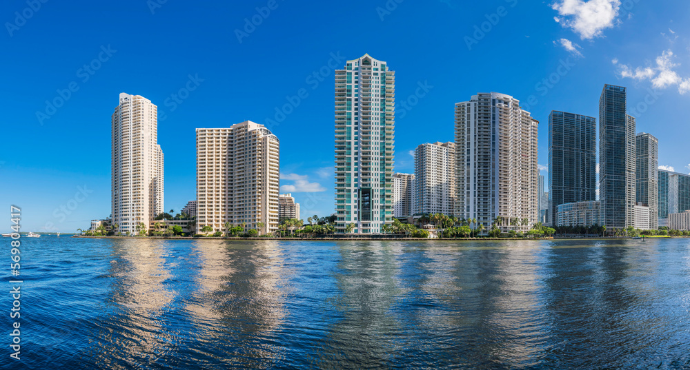 Cityscape views from Miami River Walk in Miami, Florida. There is a ...