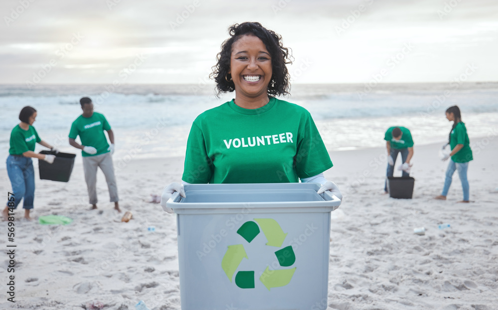 People Recycling On Beach