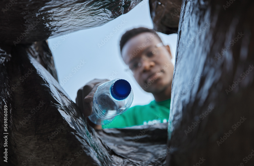 Recycle, bottle and black man with view in bag, sustainability and ...