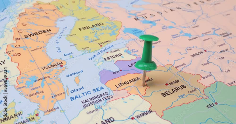 Lithuania - Travel concept with green pushpin on the world map. The ...