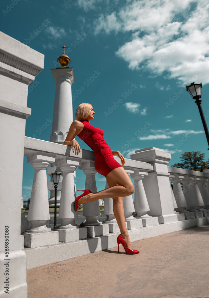 Beautiful Blonde Girl In Red Dress With Perfect Legs And Red Shoes With