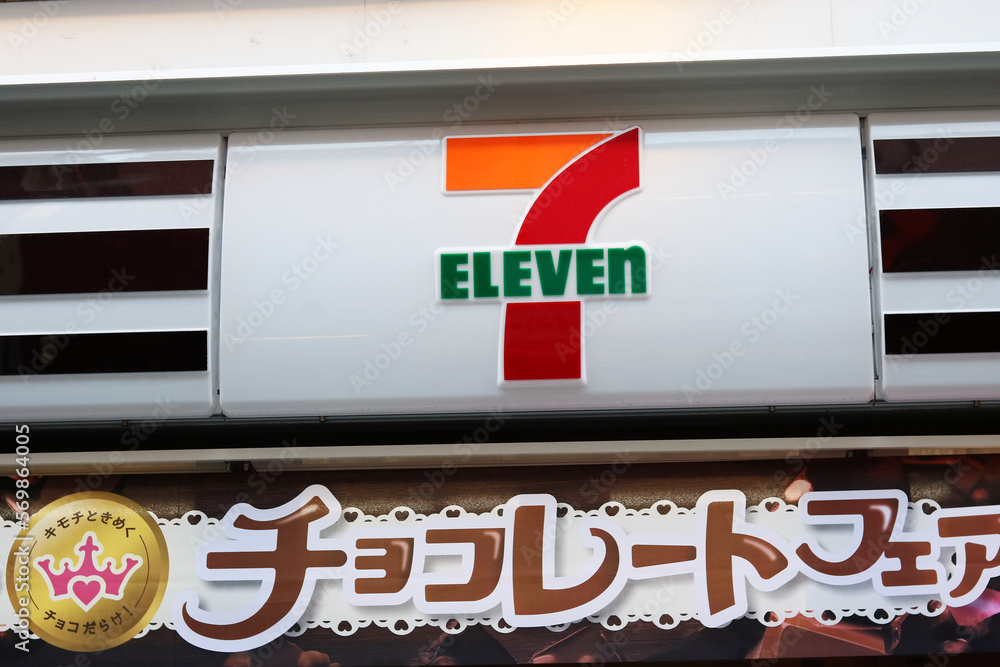 TOKYO, JAPAN - February 9, 2023: Sign on a 7-Eleven convenience store ...