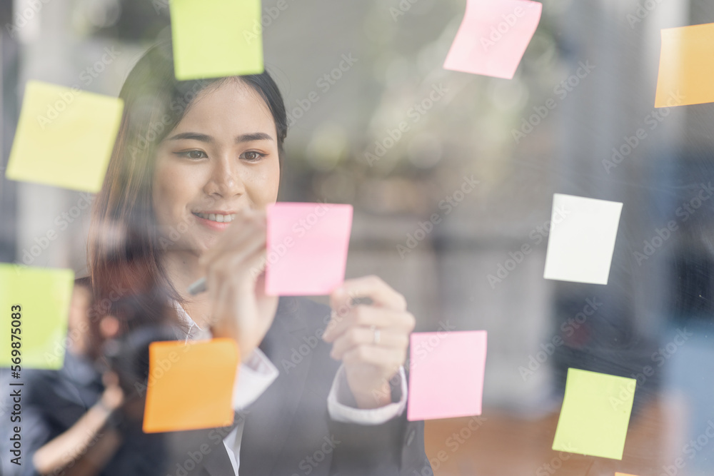 Business female employee with many conflicting priorities arranging ...