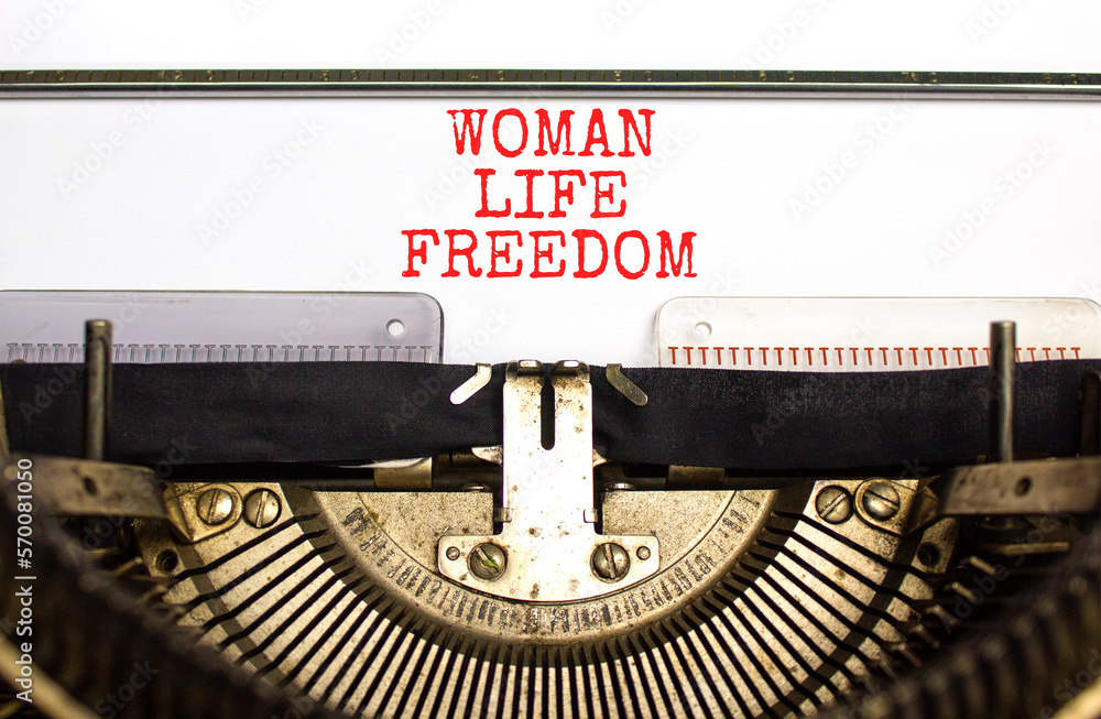Woman life freedom symbol. Concept words Woman Life Freedom typed on an ...