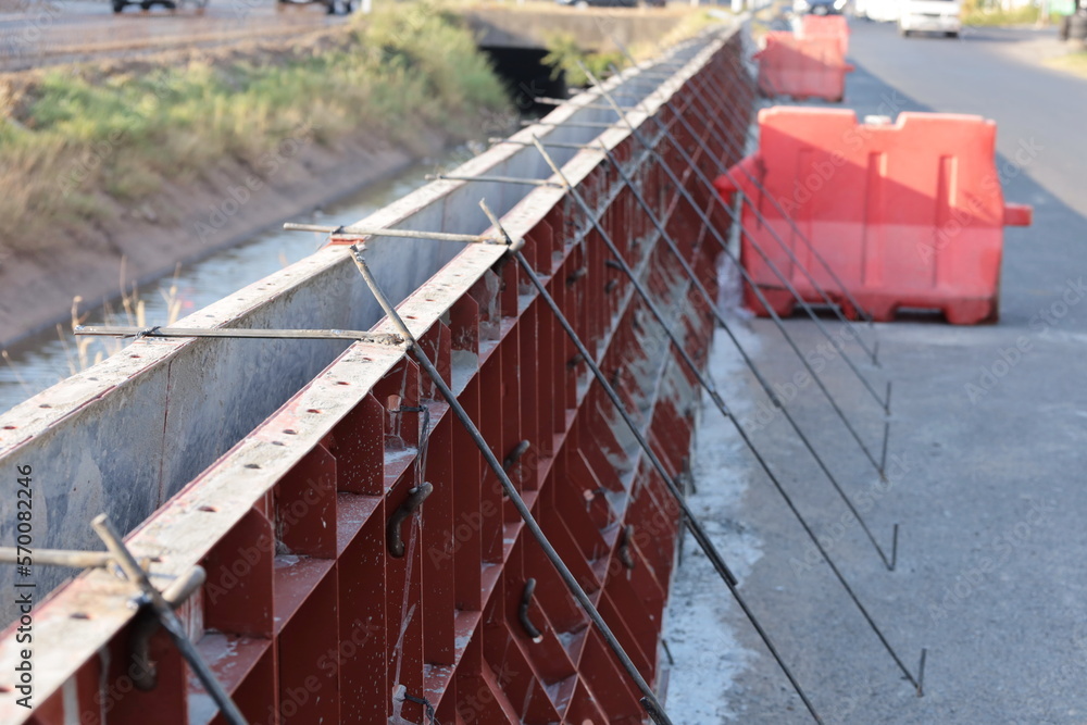 Formwork metal with bracing. Close-up of red concrete steel formwork ...