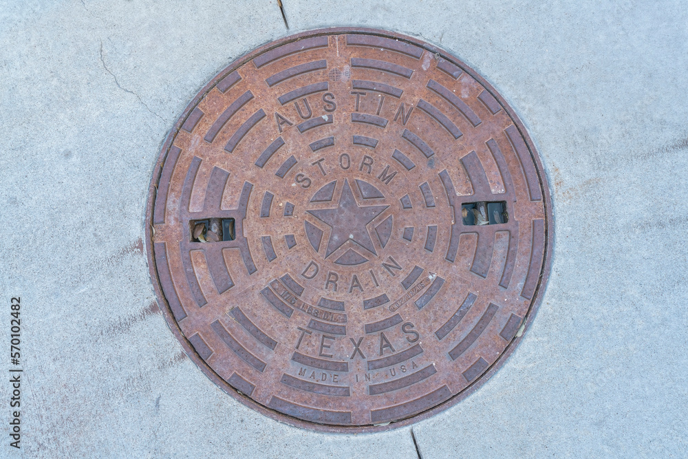 AUSTIN, TEXAS - CIRCA APRIL 2022: Storm drain covered manhole at ...