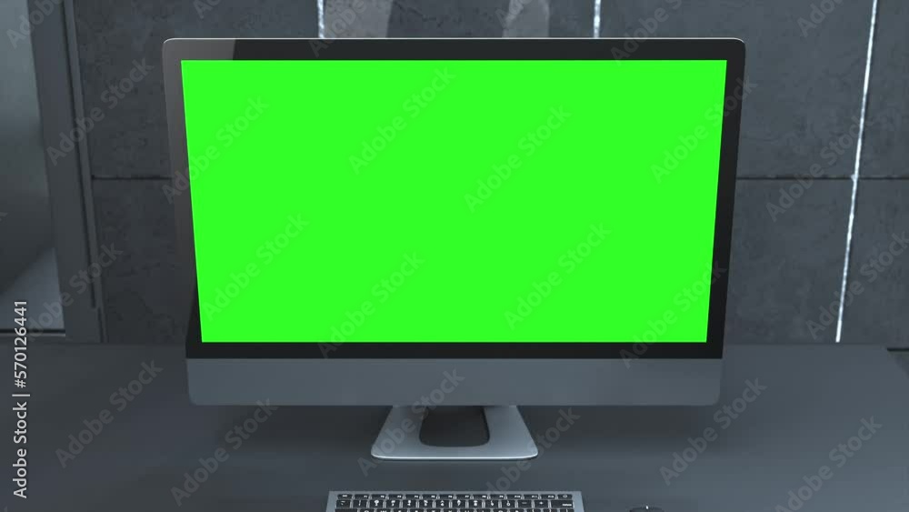 Computer Green screen Mock-Up on work desk in office dark room ...