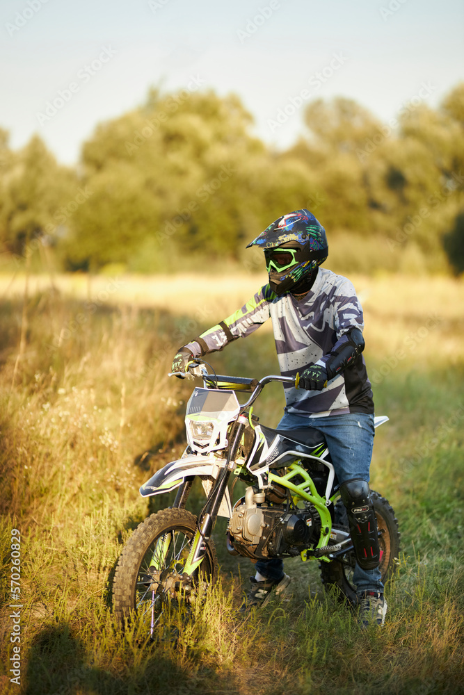 Enduro rider on an enduro motorcycle. Photo of an enduro rider. a ...