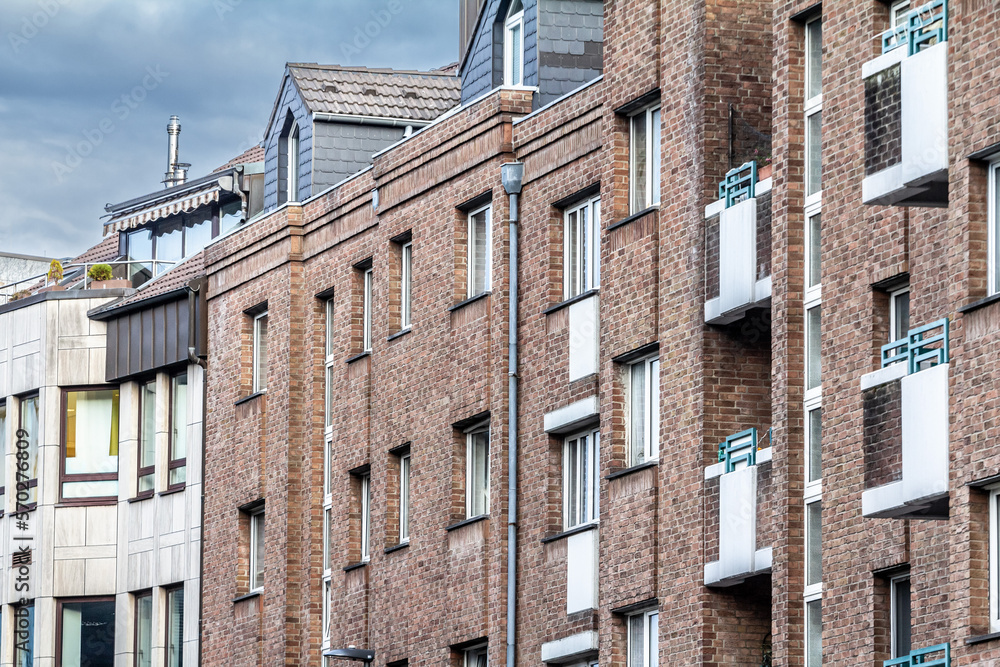 Typical residetial street with multistorey residential buildings in a ...