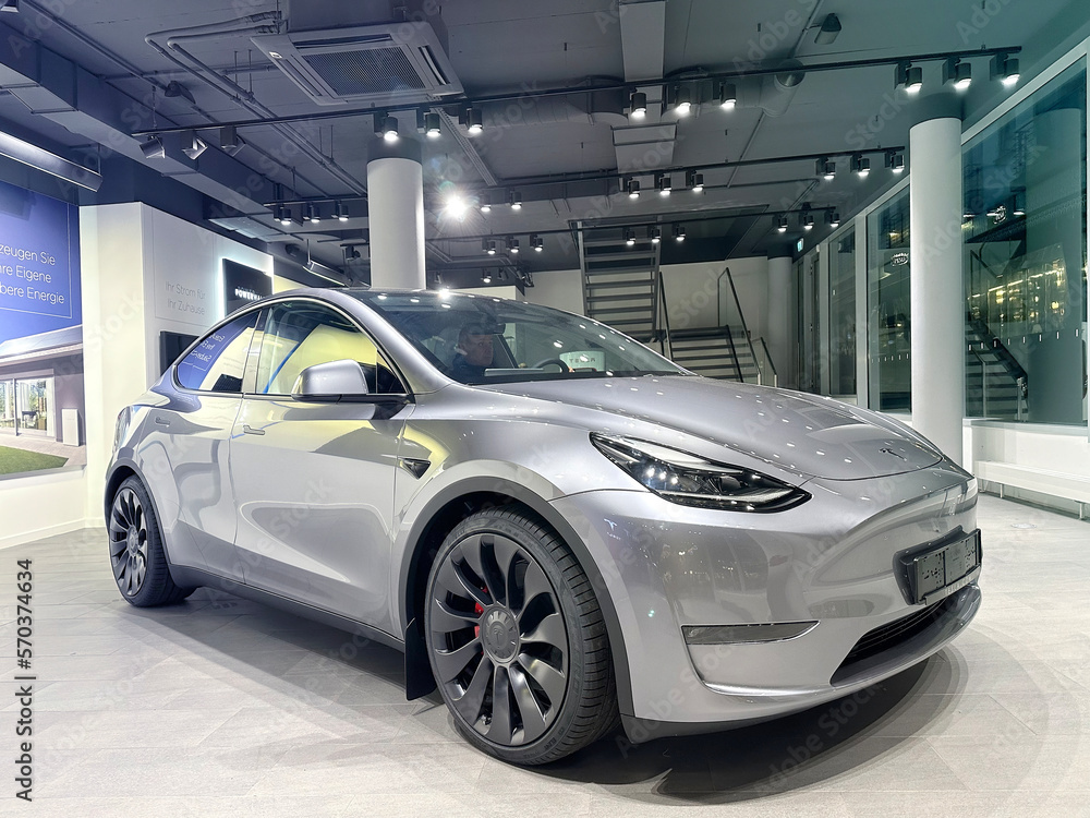 Tesla car model Y in liquid silver dubbed Mercury Silver Metallic color ...