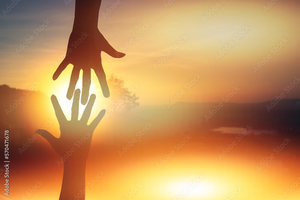 Silhouette of helping hands concept and international day of peace ...