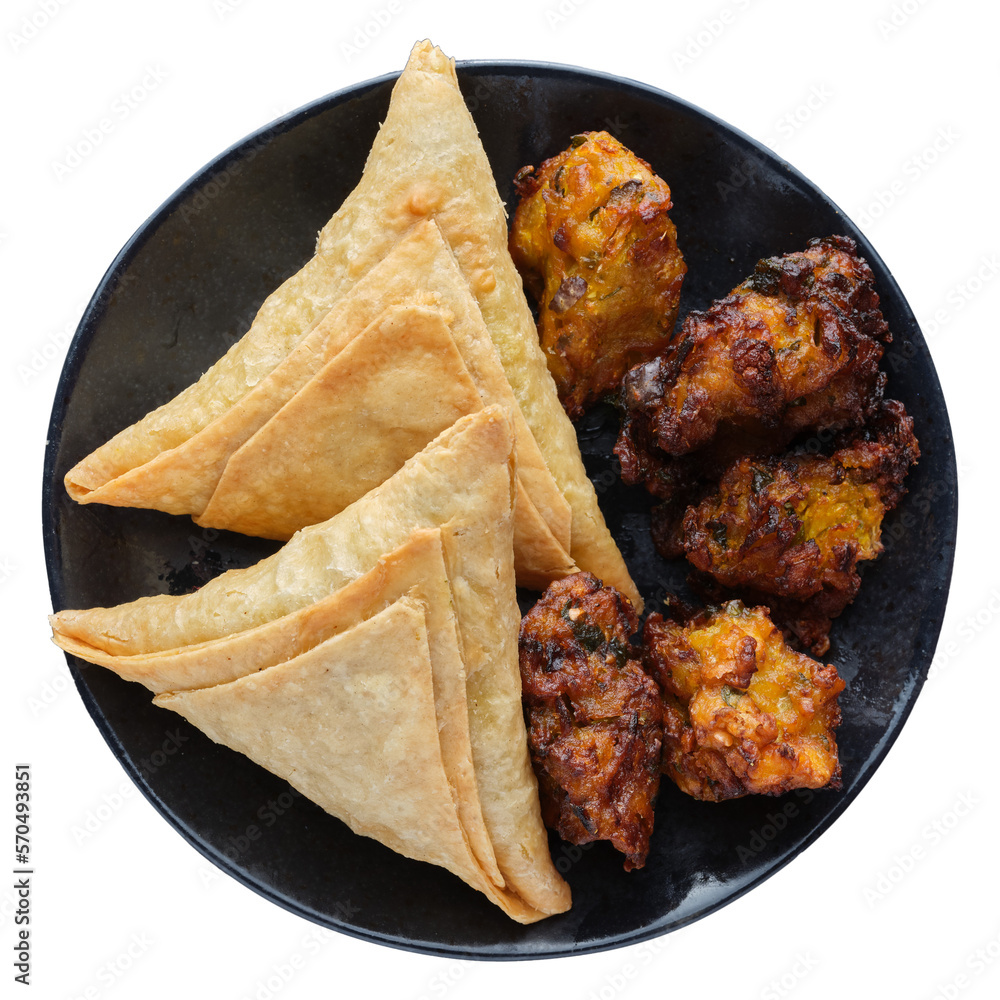 indian samosas and pakoras on plate shot from top down view and ...
