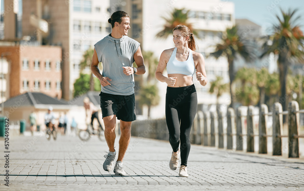 Couple, running and training together in the city for exercise, workout ...