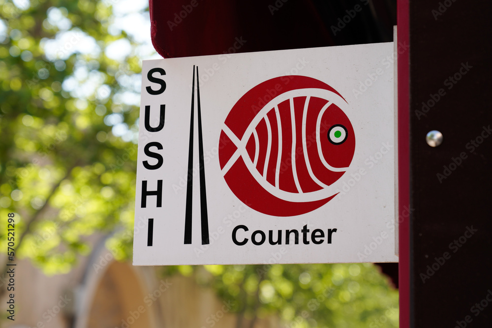 sushi counter text brand and logo sign on wall asian restaurant wall ...