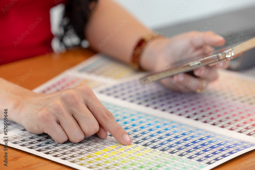 Close up, Woman's hands chosen color shades samples. Female interior ...
