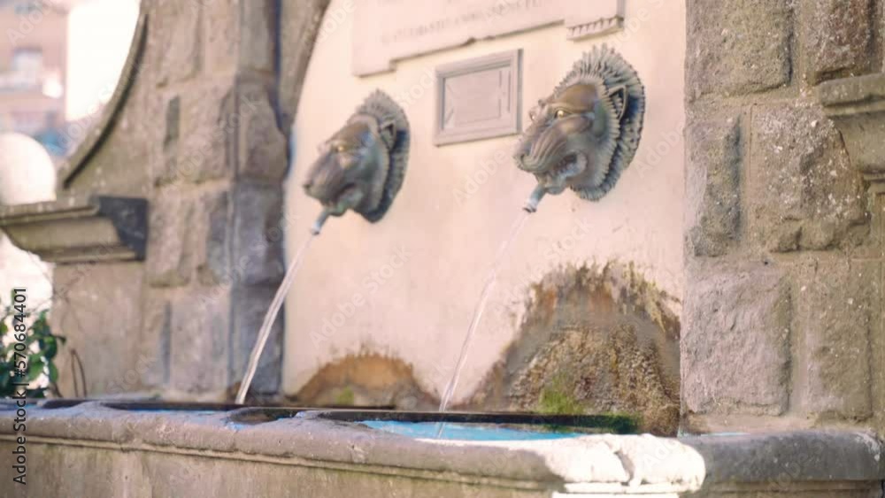 Architectural fountain with clean drinking water on the street of ...
