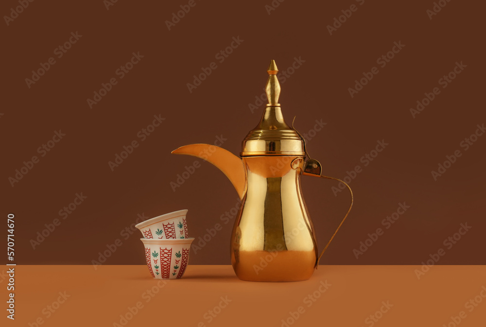 dallah is a metal pot with a long spout designed specifically for ...