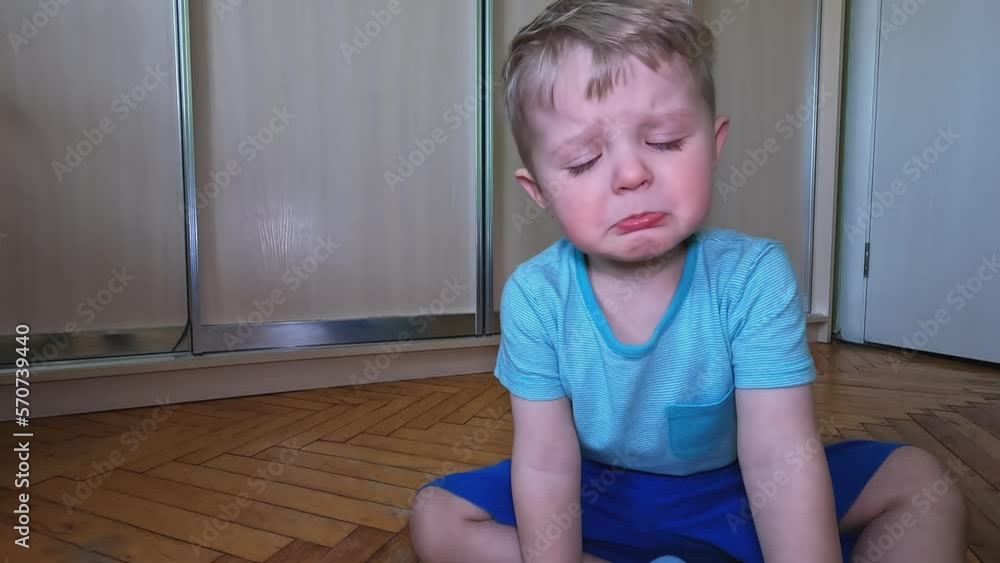 An upset, unhappy child cries, he has a nervous breakdown.Copy space ...