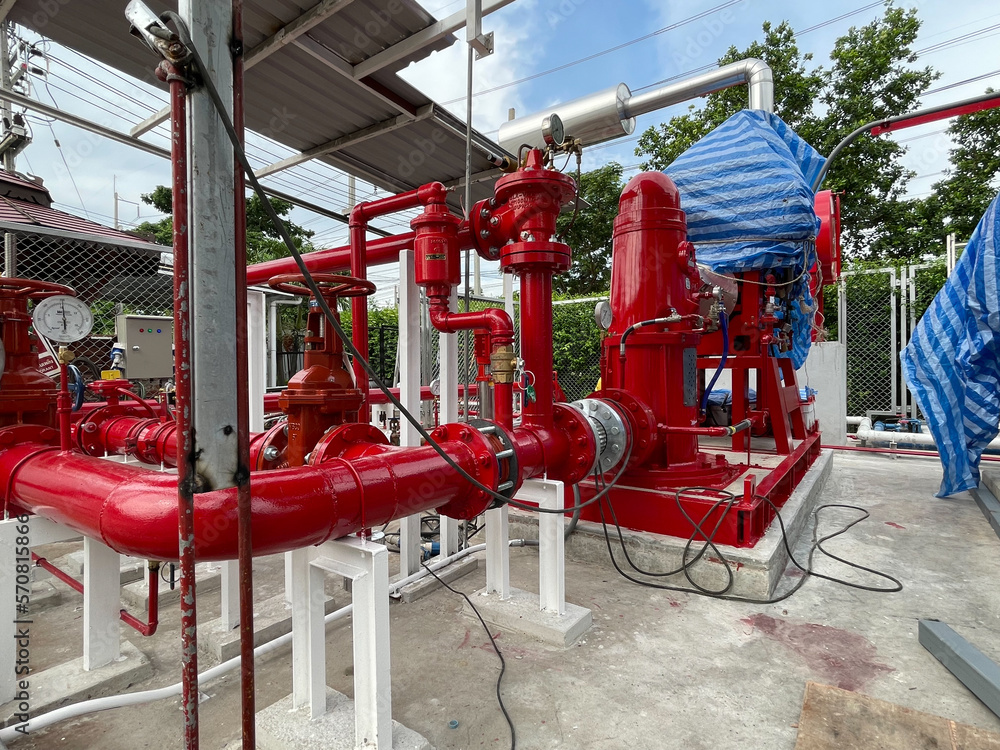 Red fire hydrant, pipe fire pump system in the factory. Stock Photo ...