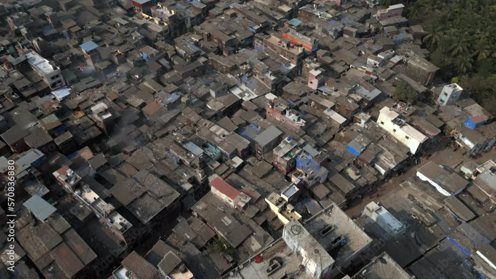 Aerial view flying over the Dharavi slums in Mumbai, Maharashtra, India. Dharavi is considered ...