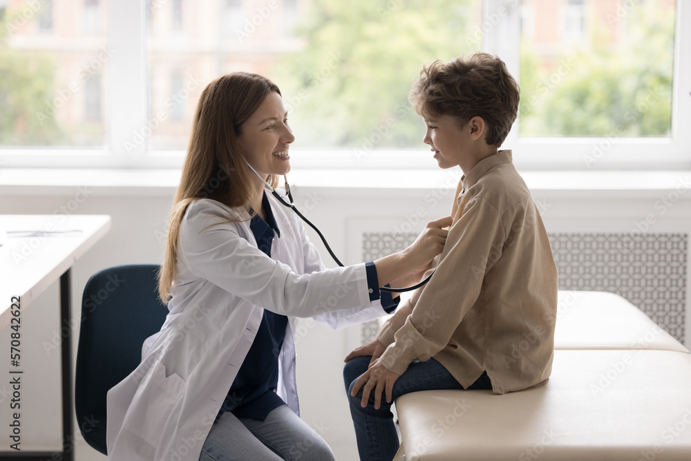 Happy kids doctor examining child for heart disease, flu, respiratory ...