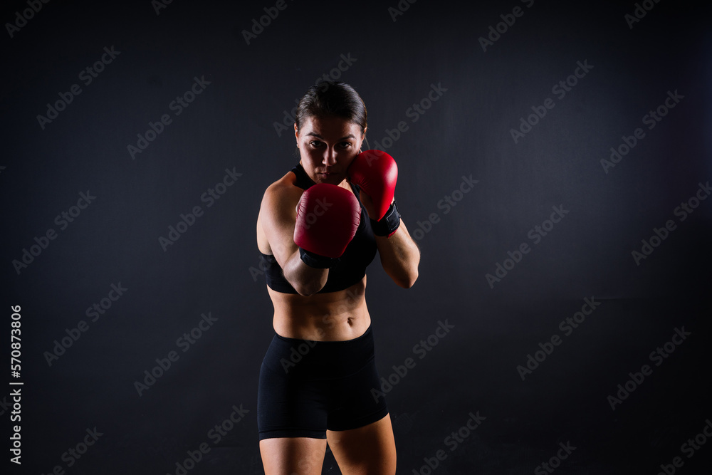 Woman do high kick, tae-bo. Athletic fit female with perfect body kick ...